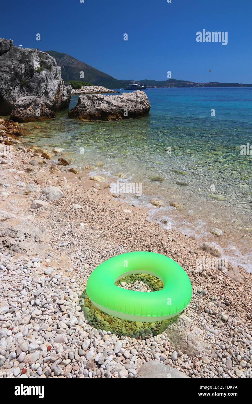 Mlini beach in Croatia. Dalmatia region Adriatic Sea coast. Inflatable ...
