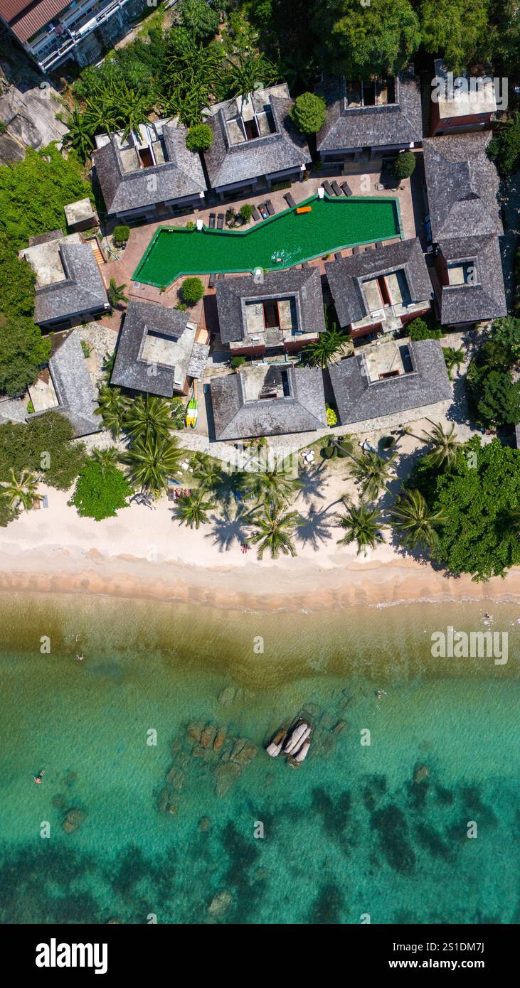 Drone top down aerial view of a resort in front of the beach in Koh Tao ...