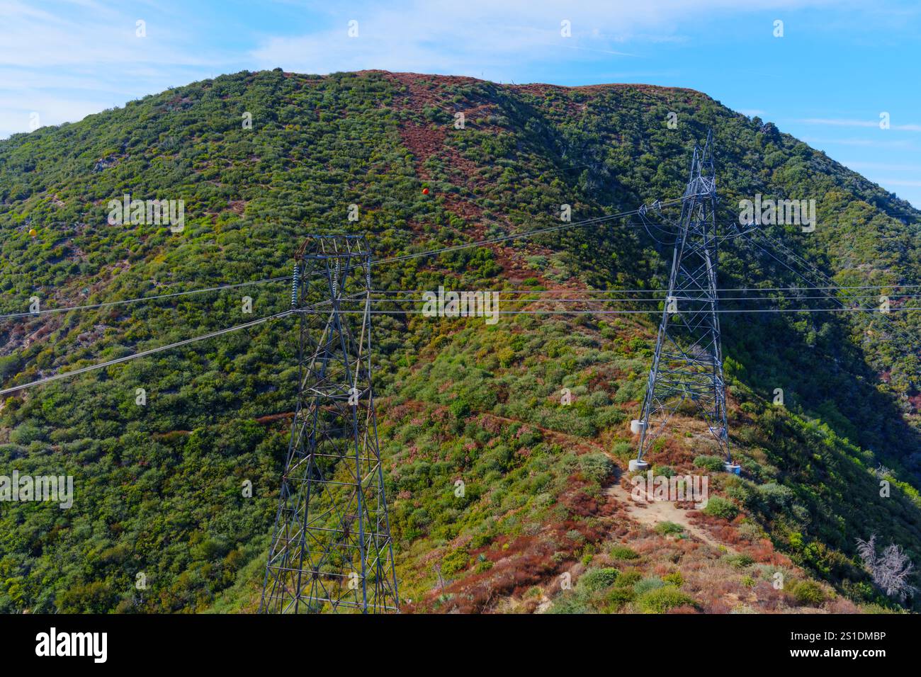 Power lines stretch across vibrant green hills in Angeles National ...
