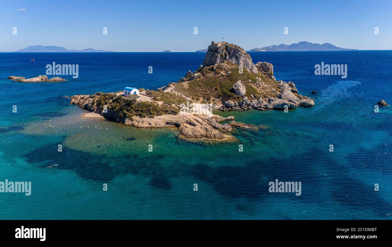 Drone aerial view of Kastri Island with white church in Kefalos, Kos ...