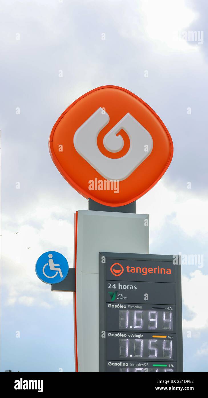 Galp gas station sign displaying tangerina brand, fuel prices, and ...