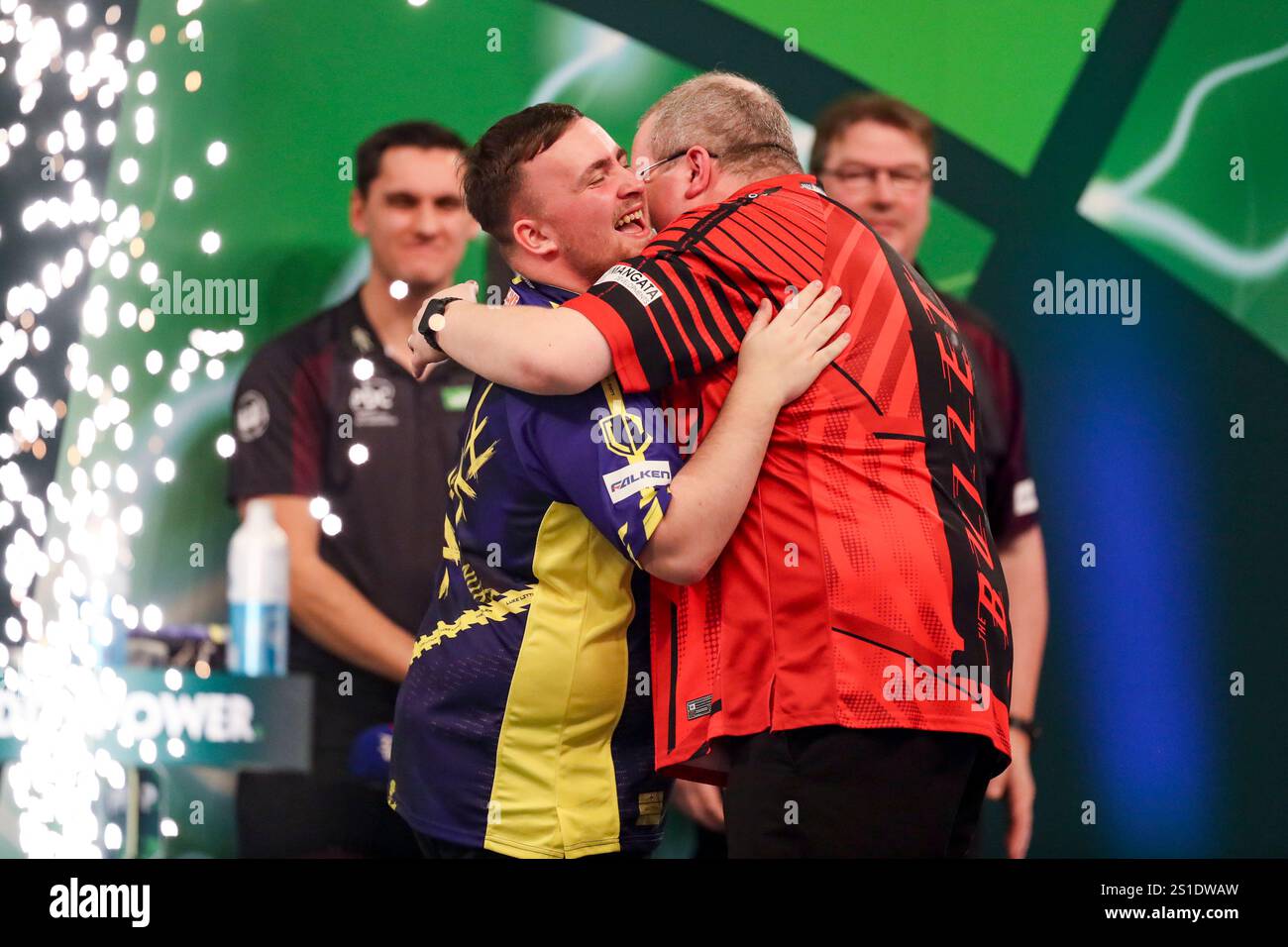 Luke Littler celebrates hugs Stephen Bunting after winning during the ...