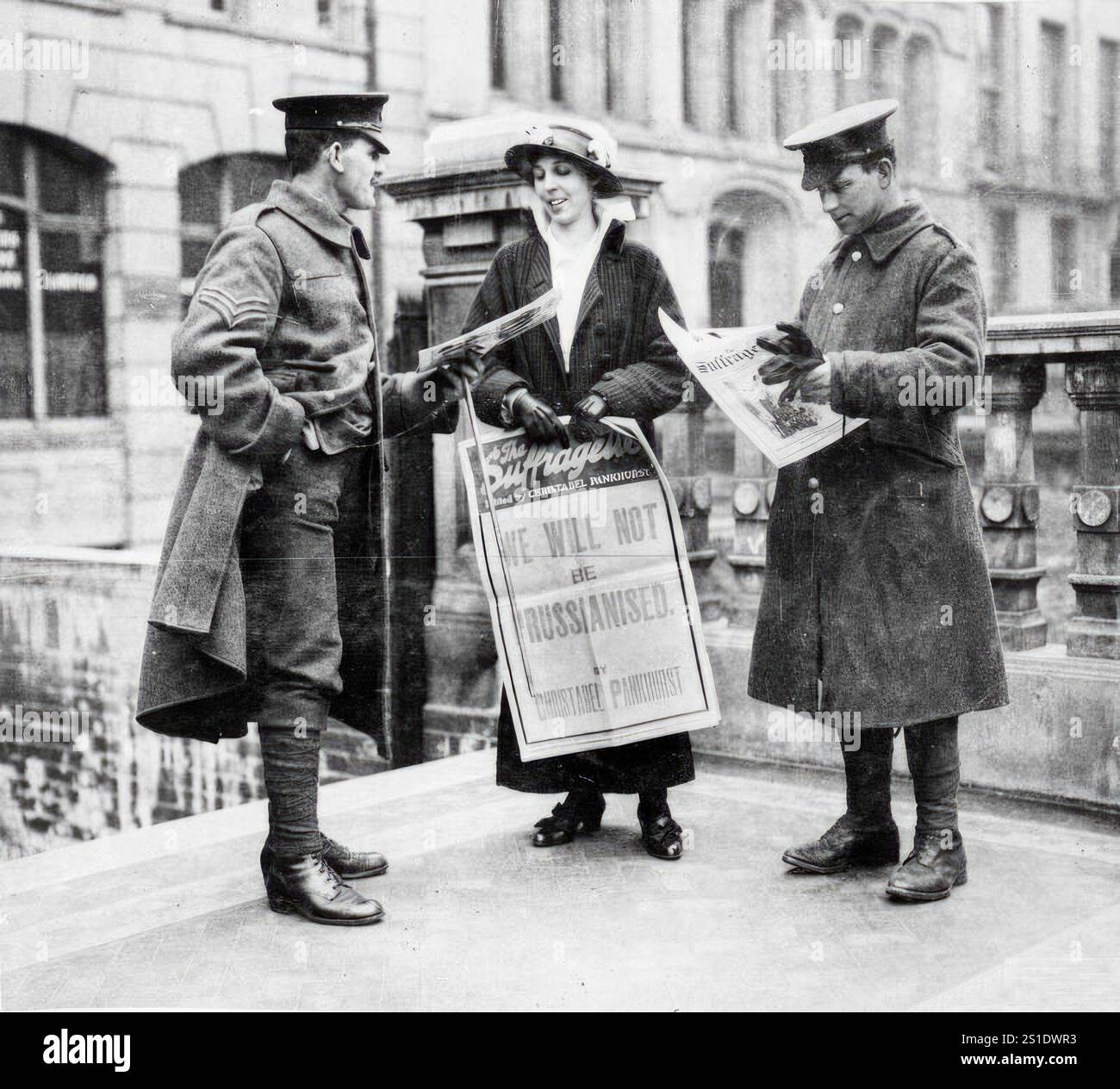 Women's rights activist giving the Suffragette newspaper to British ...