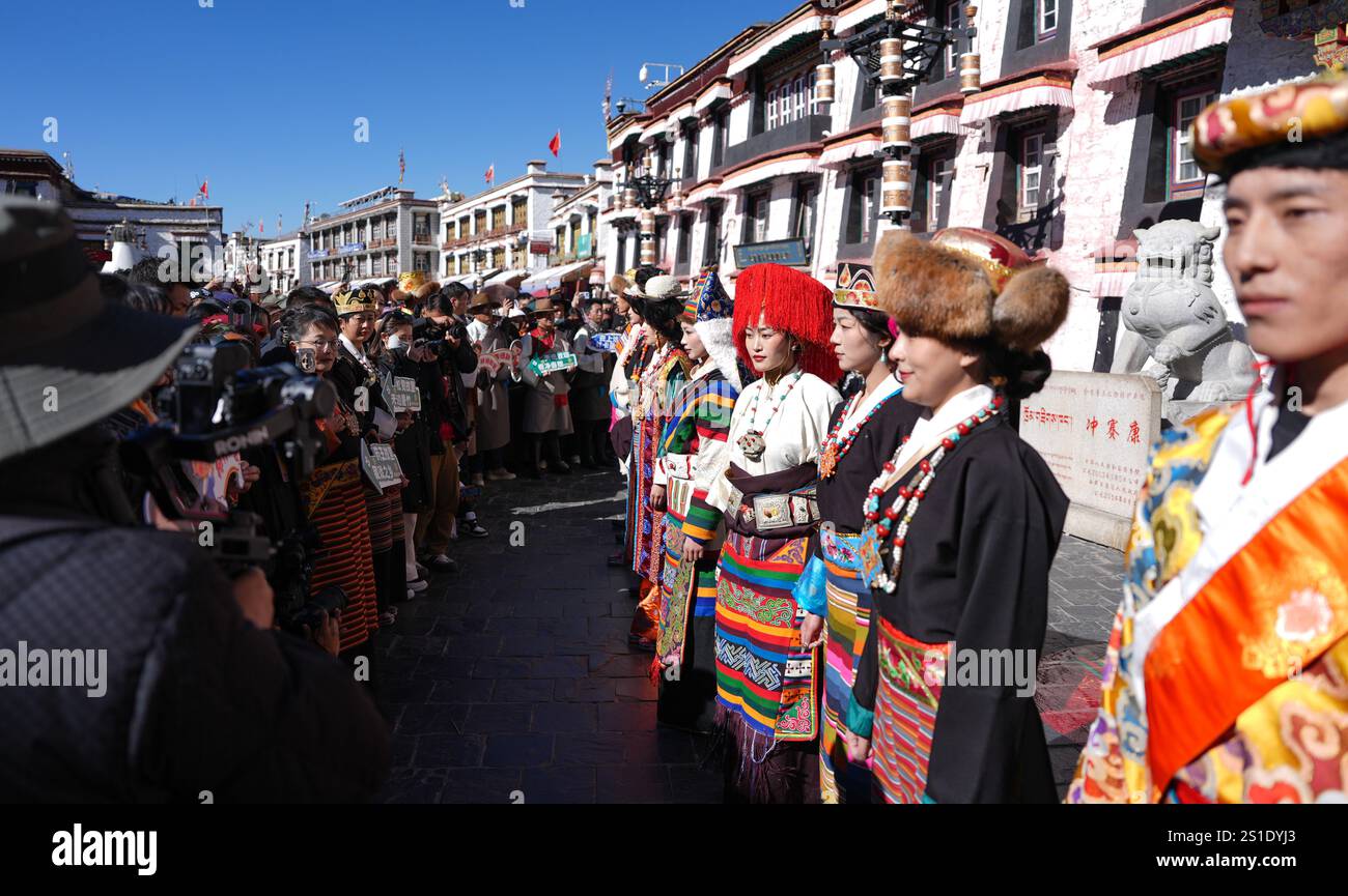Lhasa, China's Xizang Autonomous Region. 3rd Jan, 2025. Models wearing ...