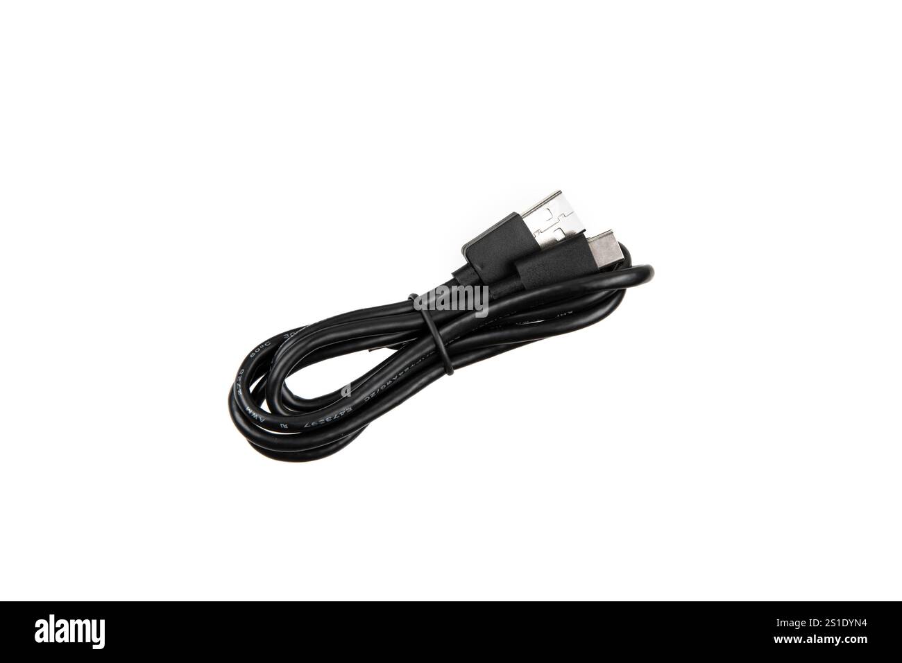Black USB cable with two connectors, neatly coiled and secured with a ...