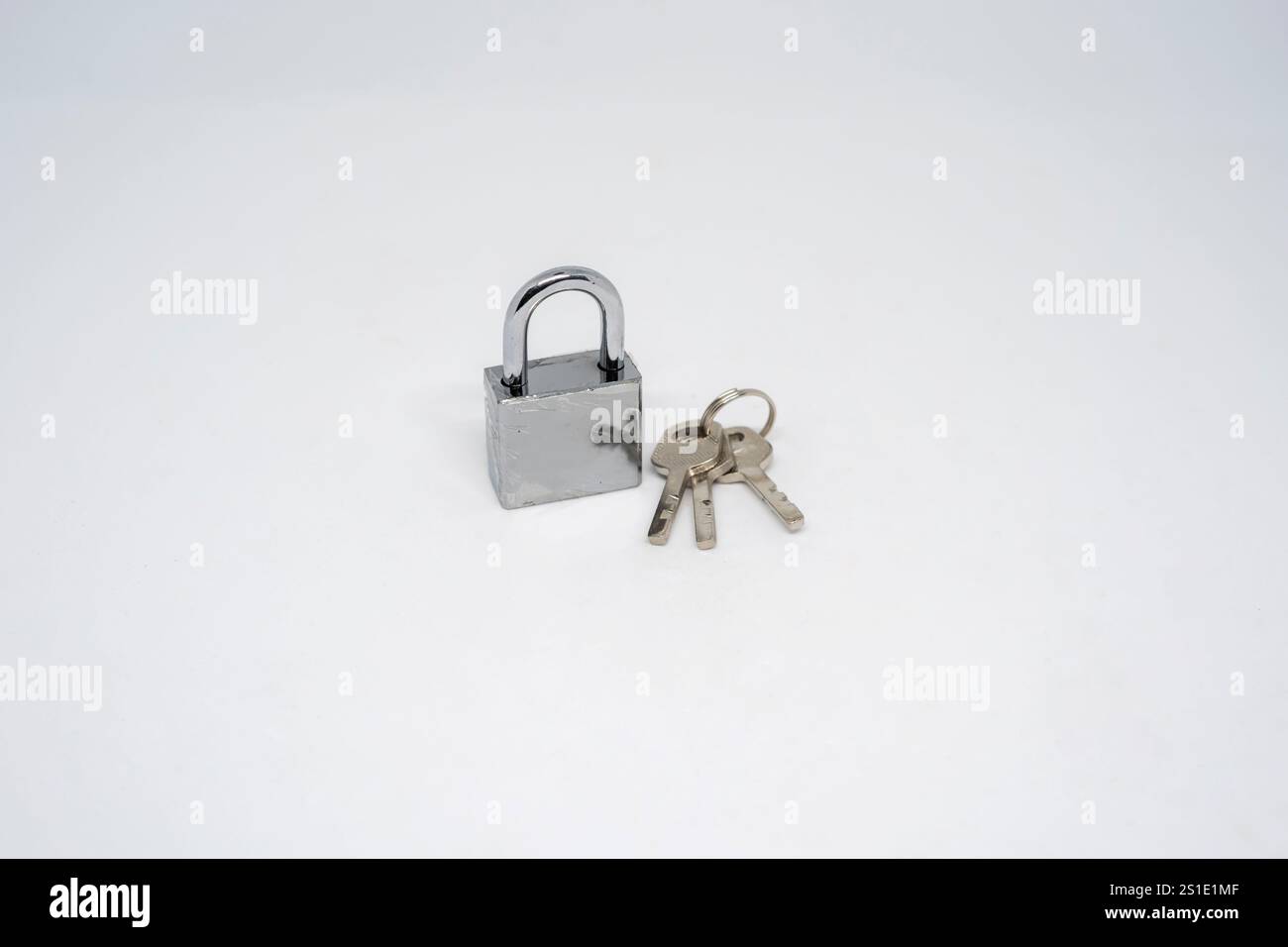 Locked Silver Padlock on a white background Stock Photo - Alamy