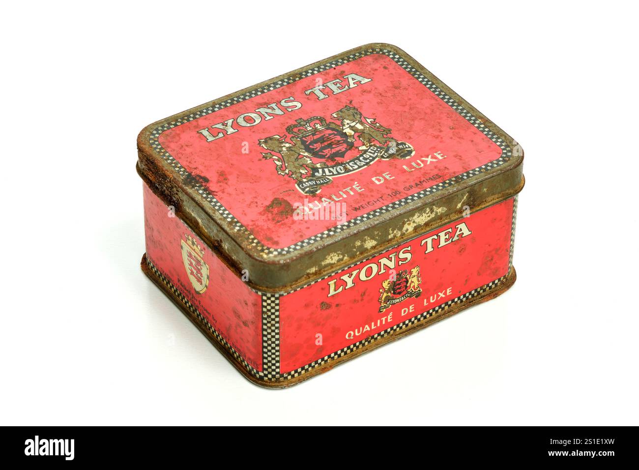 Old weathered red Lyons Tea tin. Lyons Tea is an Irish company and ...