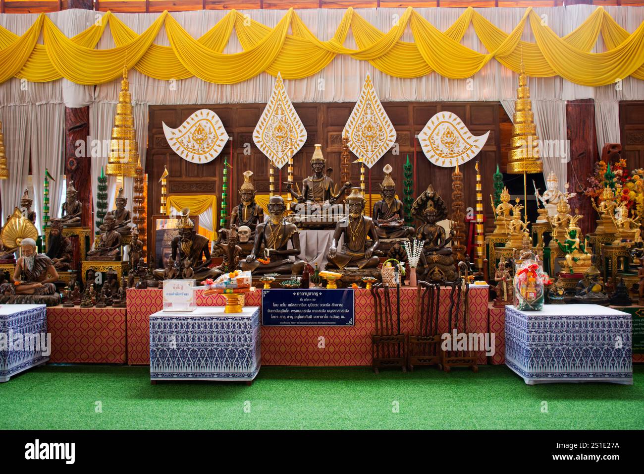 Ancient hermit or antique eremite statue with naka guardian of Wat Rat ...