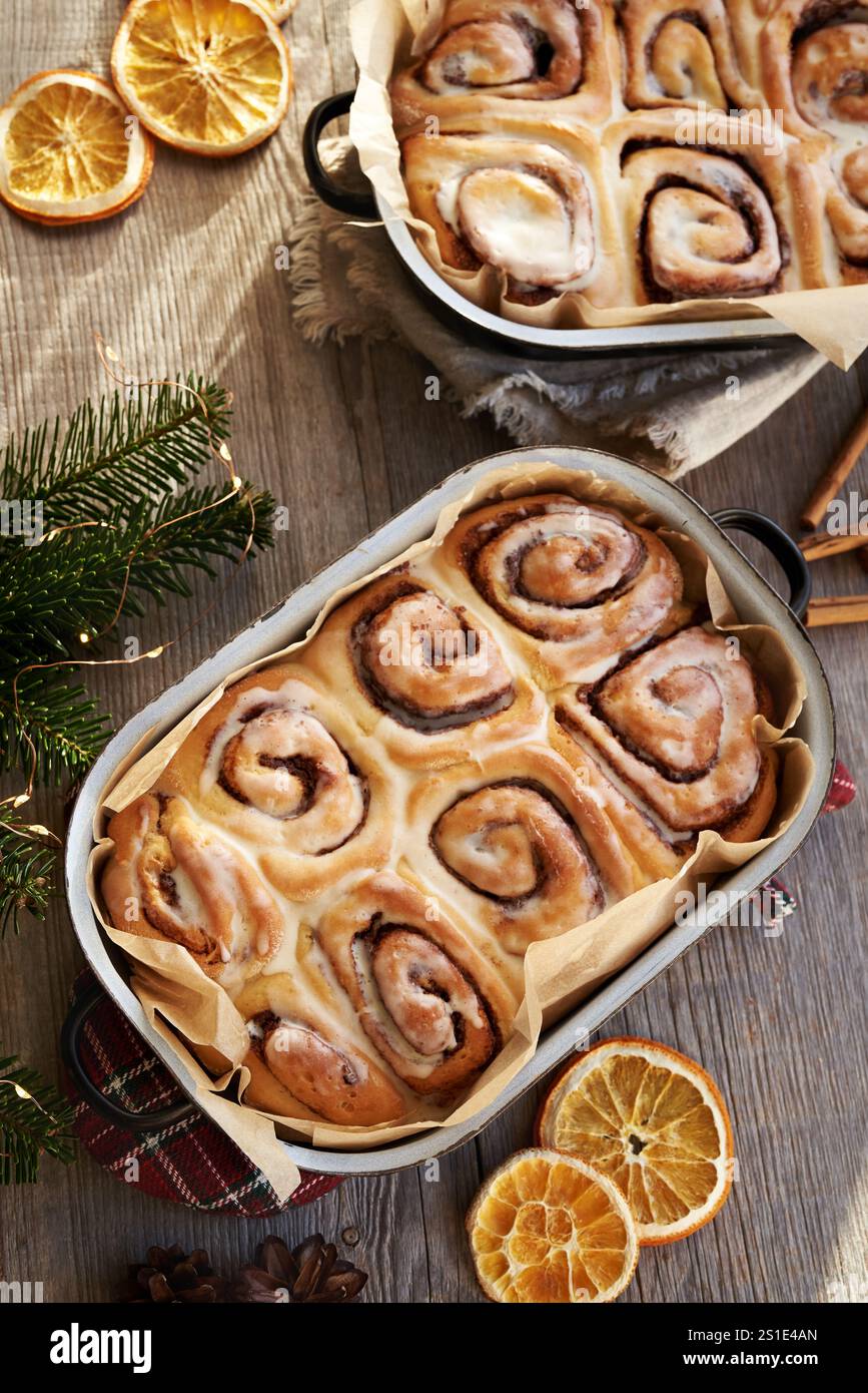 Homemade cinnamon rolls in two enameled baking pans, top view Stock ...