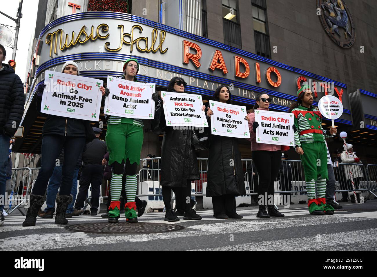 PETA activists protest outside Radio City Music Hall on January 2, 2025 ...