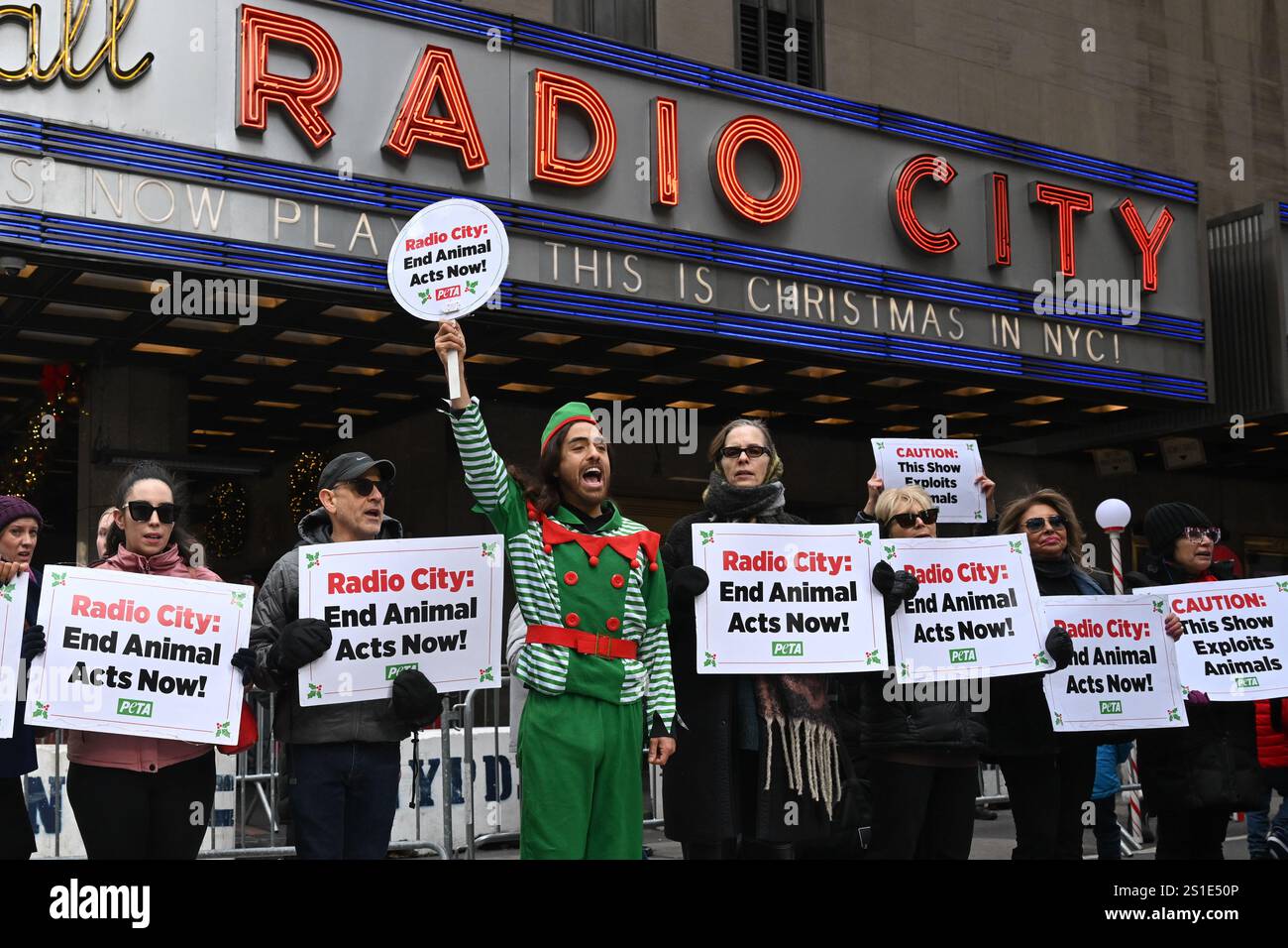 PETA activists protest outside Radio City Music Hall on January 2, 2025 ...