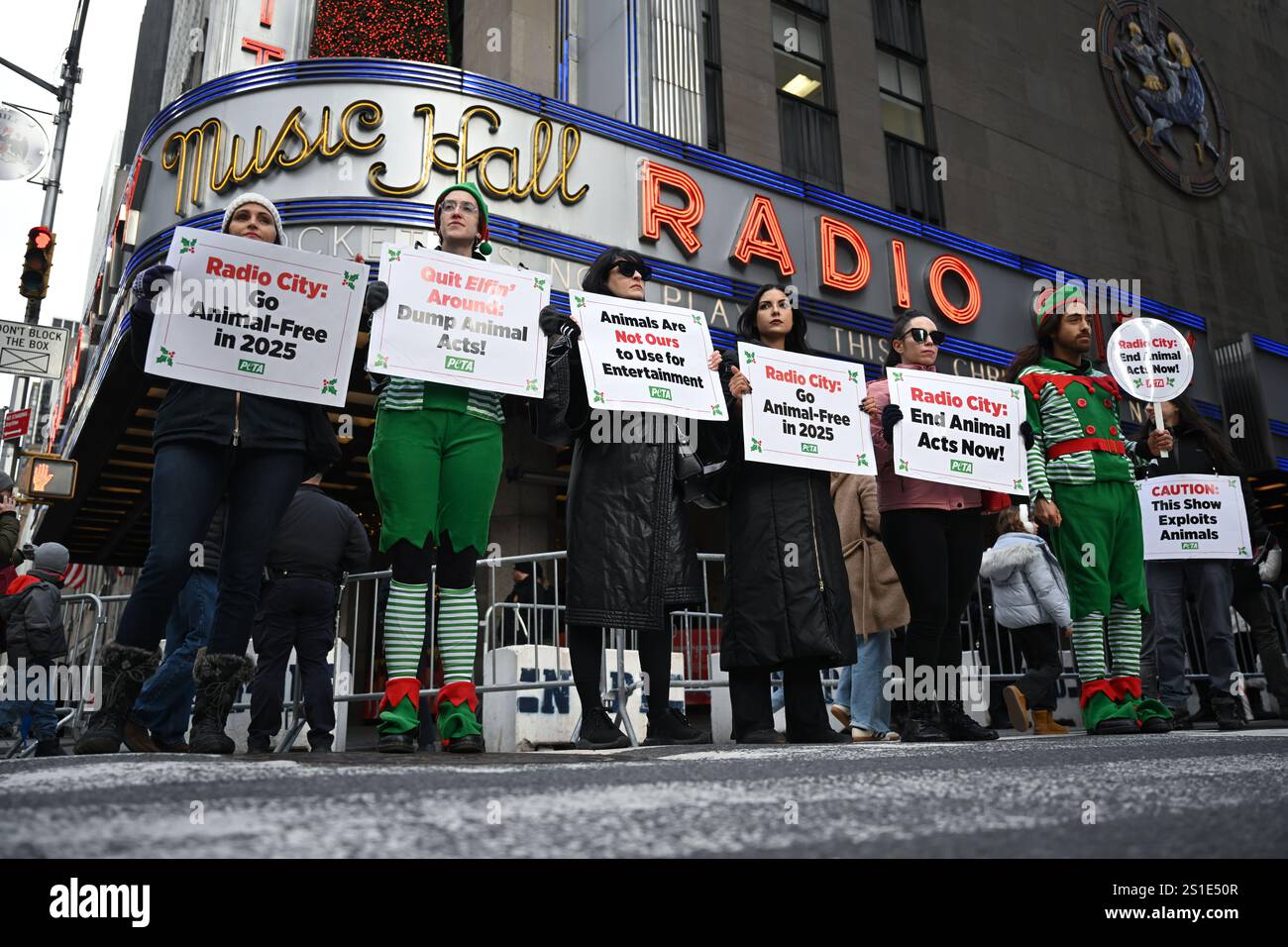 PETA activists protest outside Radio City Music Hall on January 2, 2025 ...