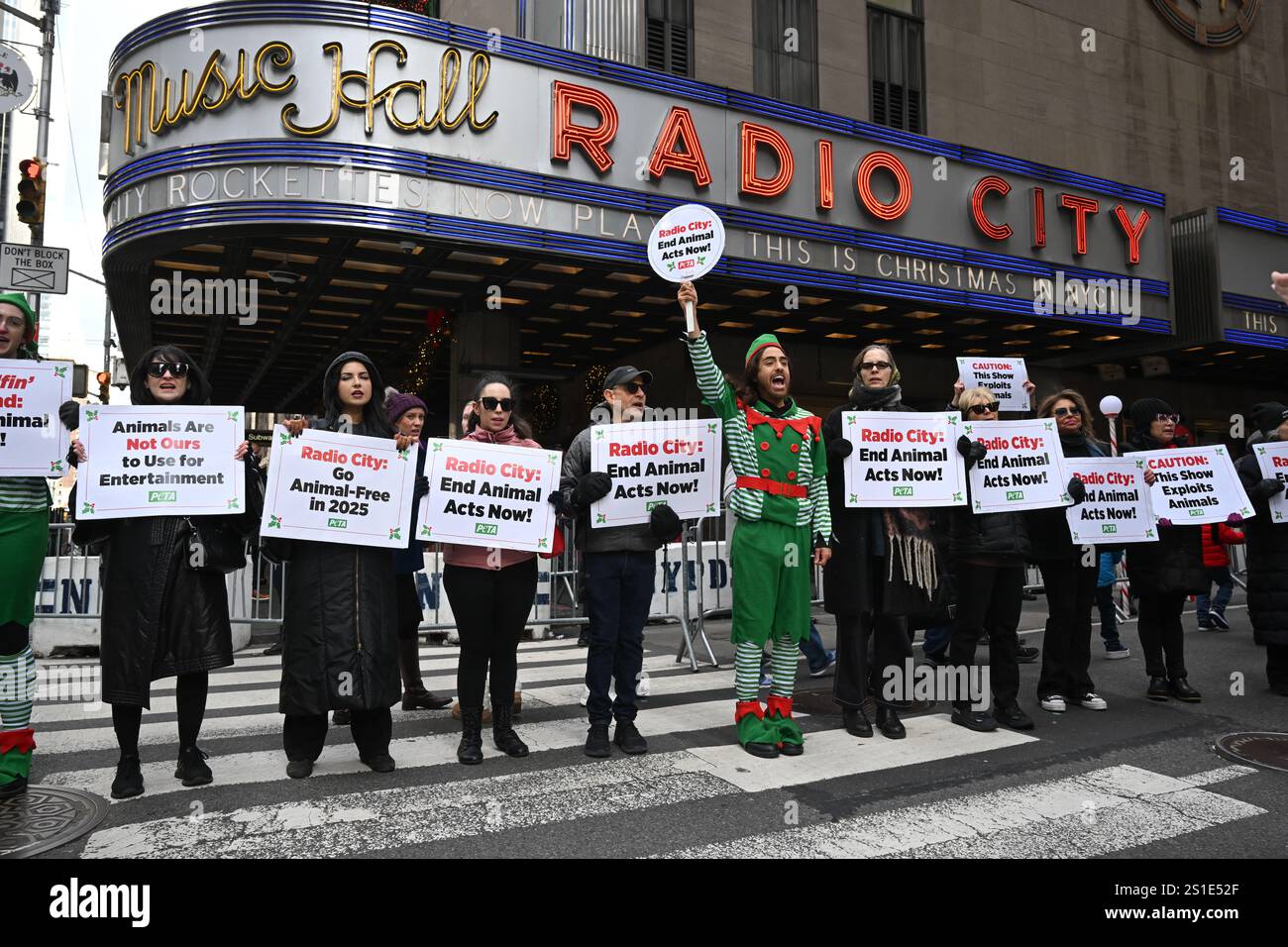 PETA activists protest outside Radio City Music Hall on January 2, 2025 ...