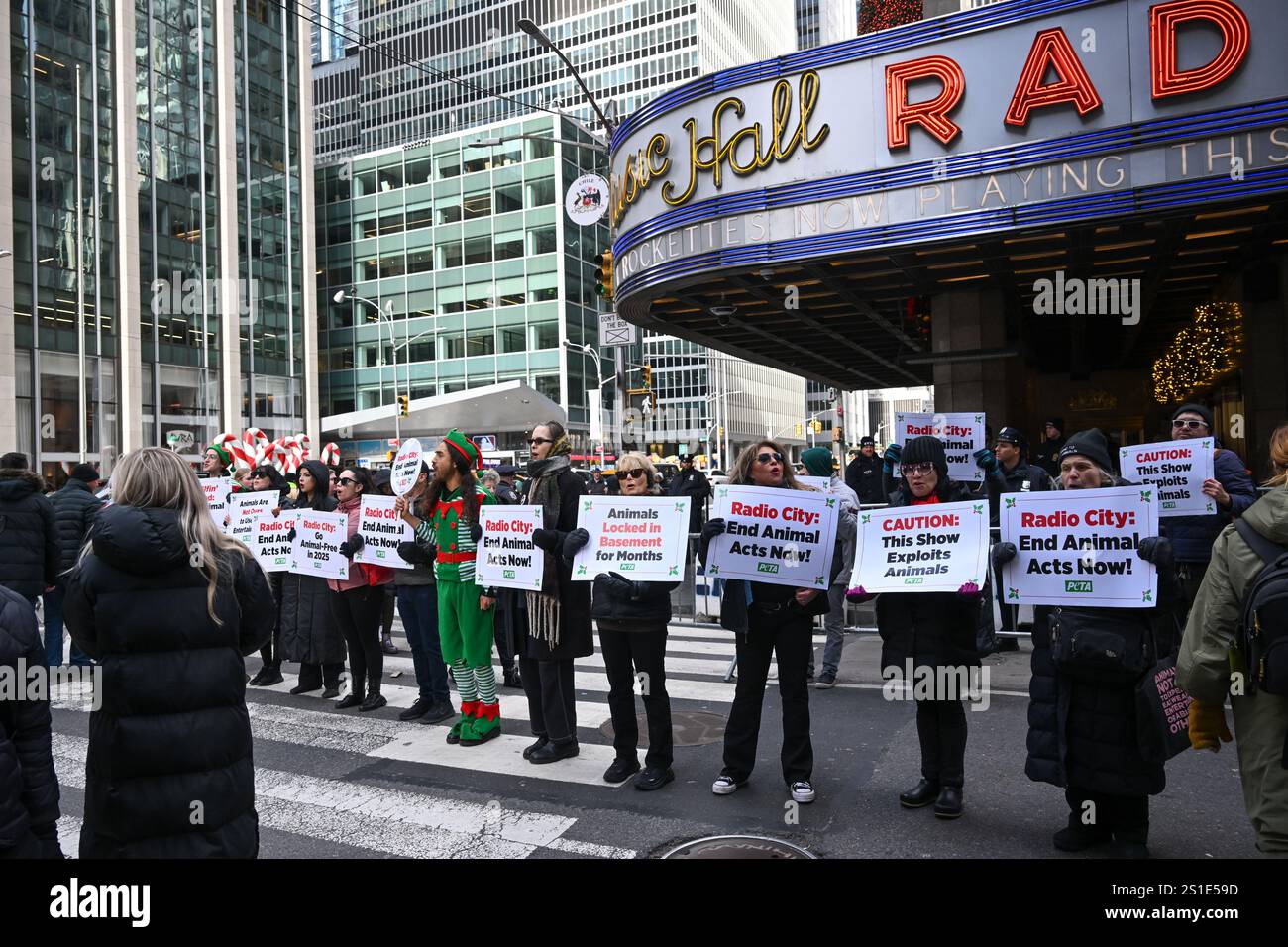 PETA activists protest outside Radio City Music Hall on January 2, 2025 ...