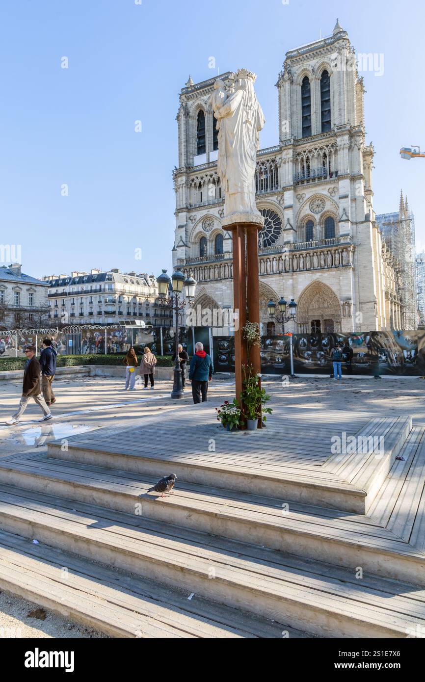 Square in front of the restored Notre Dame de Paris Cathedral with ...