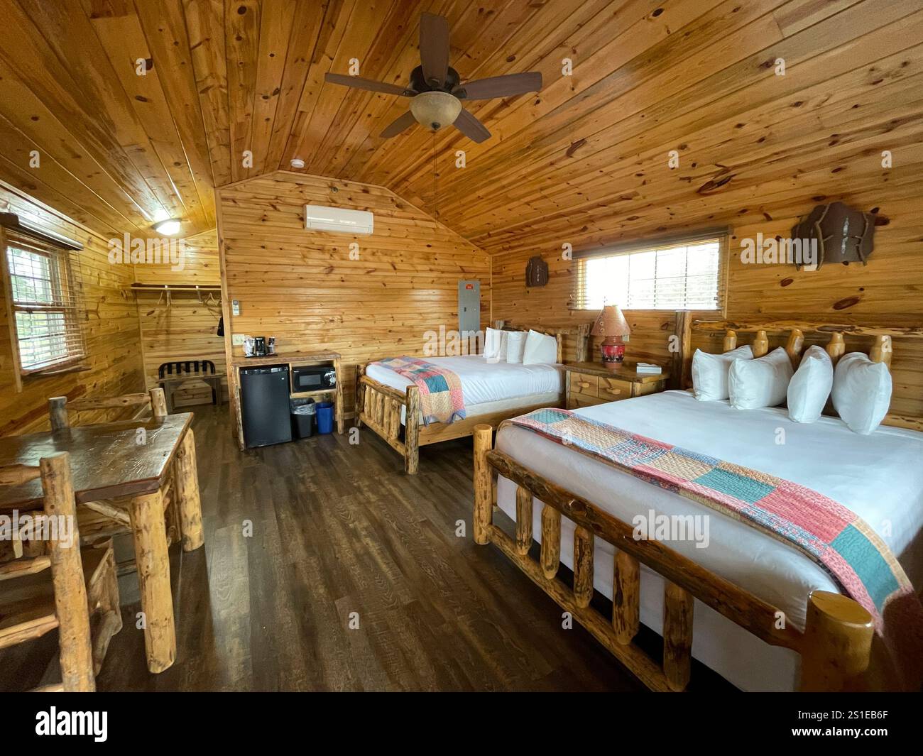 Interior of log cabin tourist accommodation in Badlands, South Dakota ...