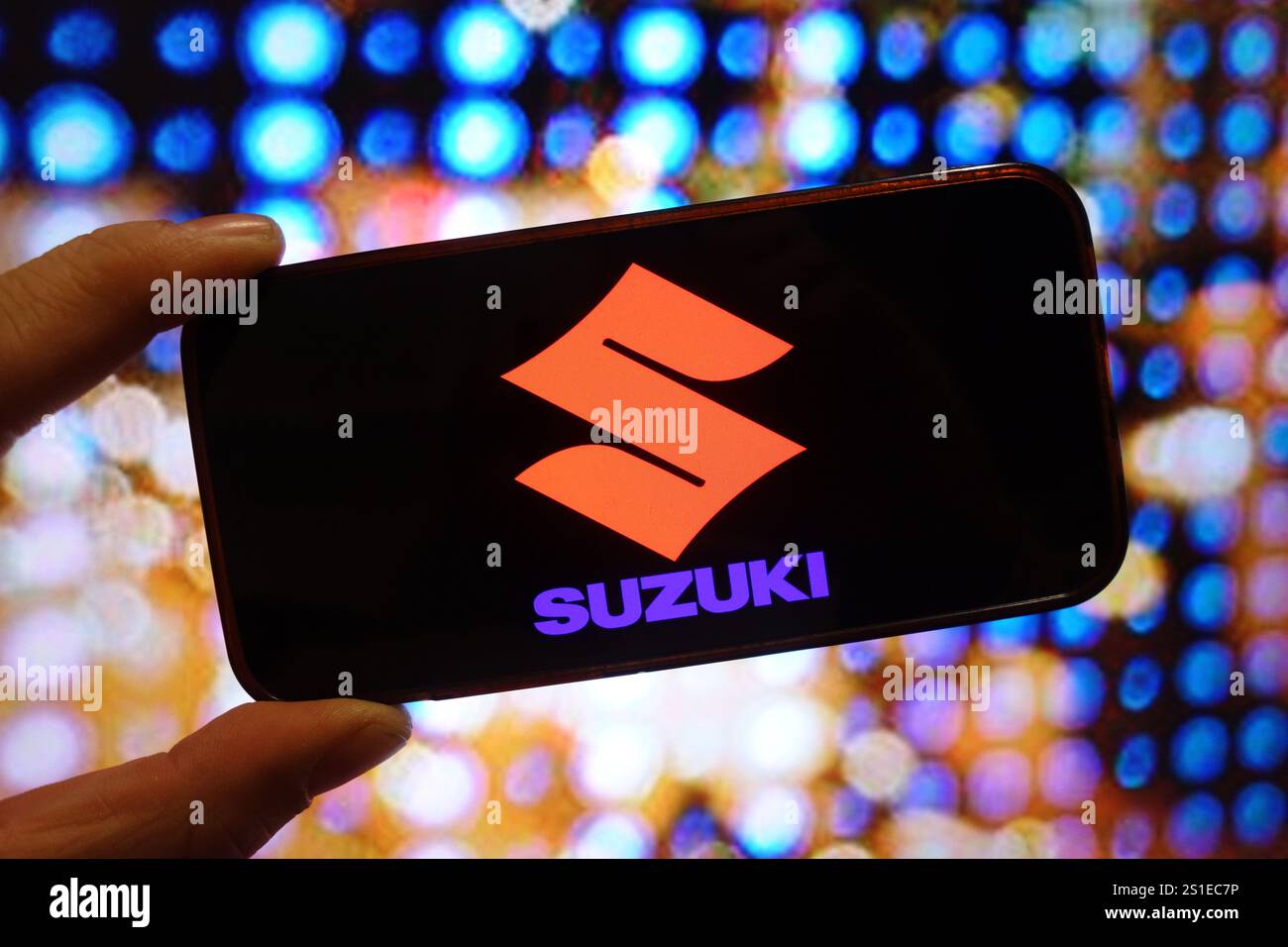 In this photo illustration, the Suzuki Motor company logo is seen ...