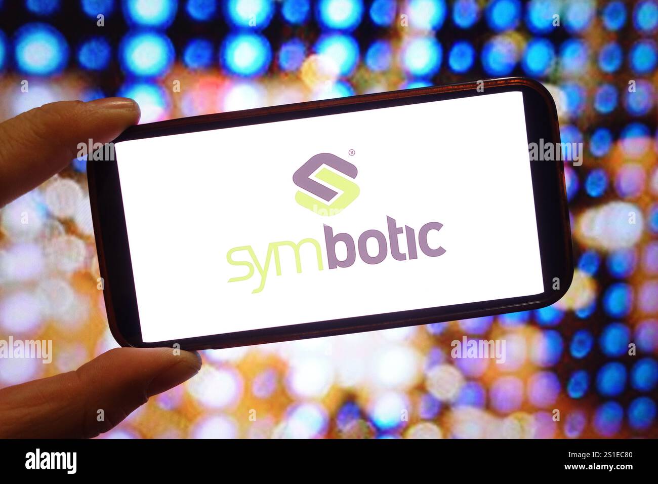 In this photo illustration, the Symbiotic company logo is seen ...