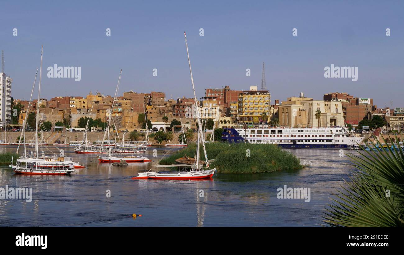 Feluccas and river boats on the Nile river, Elephantine Island, Aswan ...