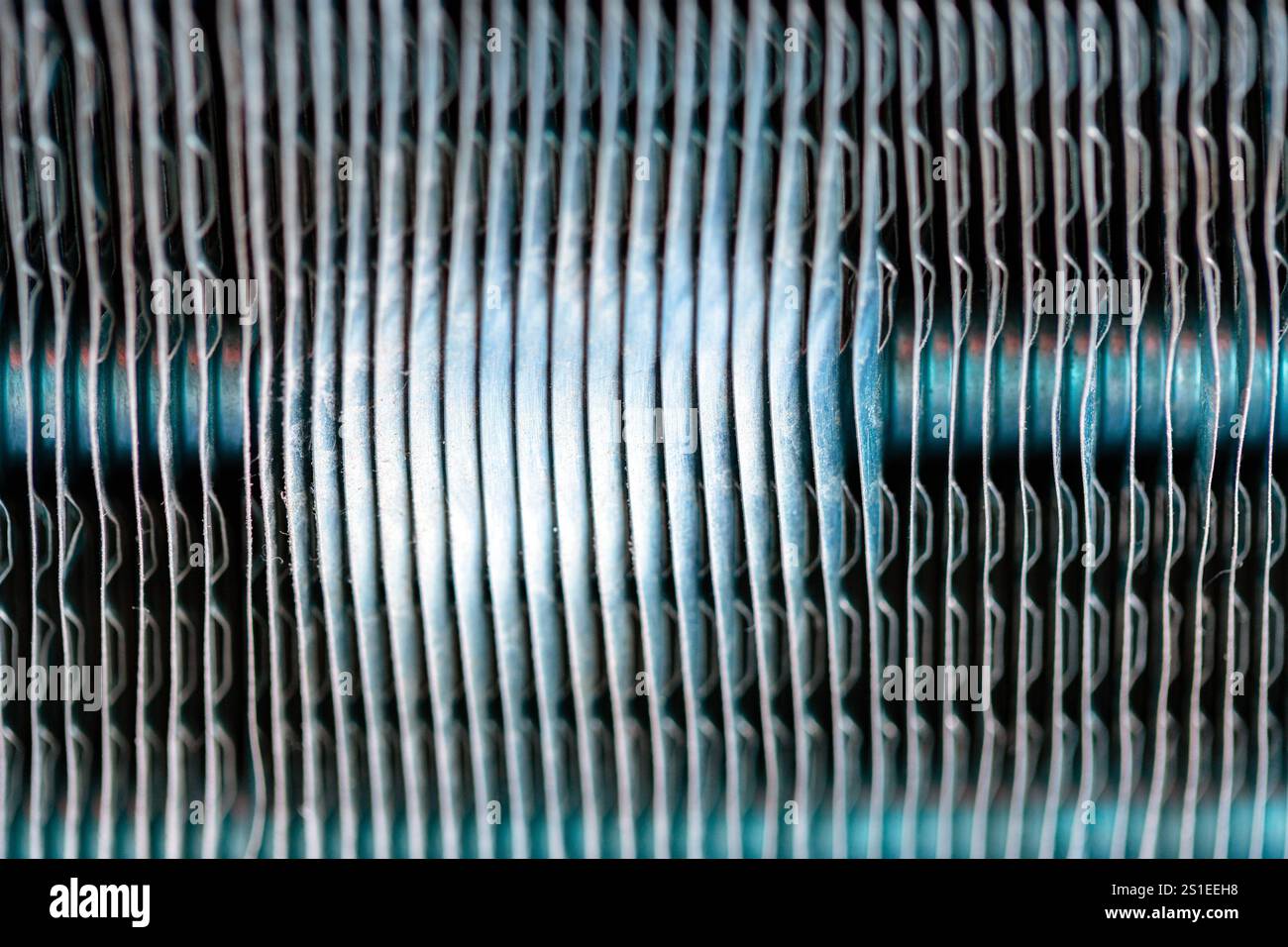 Closed up of air conditioner compressor cooling fins damaged by impact ...