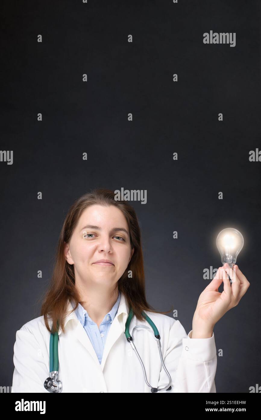 Glowing young female doctor hi-res stock photography and images - Alamy
