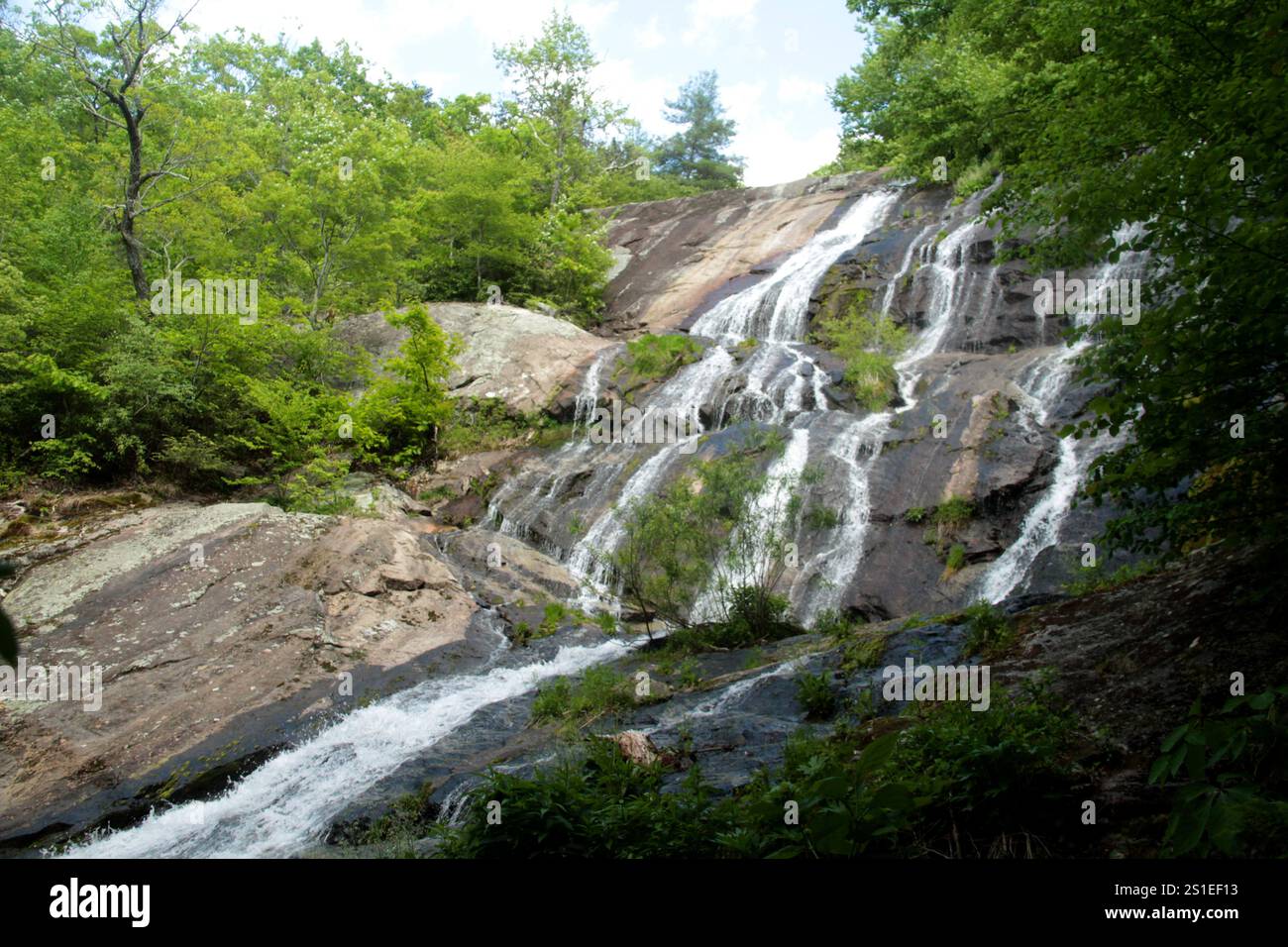 Beautiful fresh creek water cascading over rocks. Section of the ...