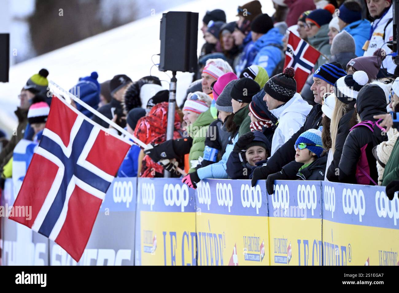 Spectators and Norwegian flag during men's cross-country skiing classic ...