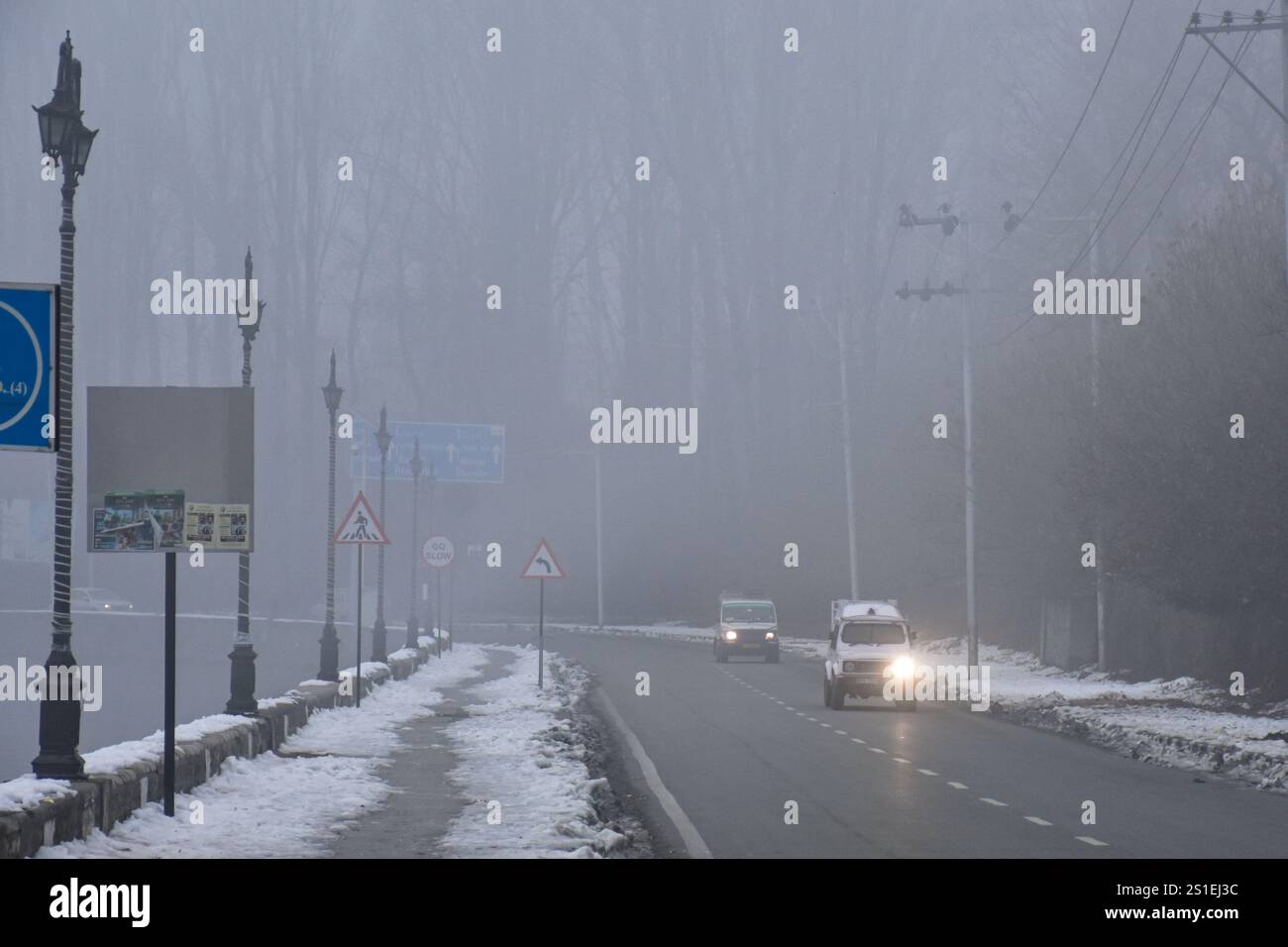 Srinagar, India. 03rd Jan, 2025. Vehicles seen moving on the road ...