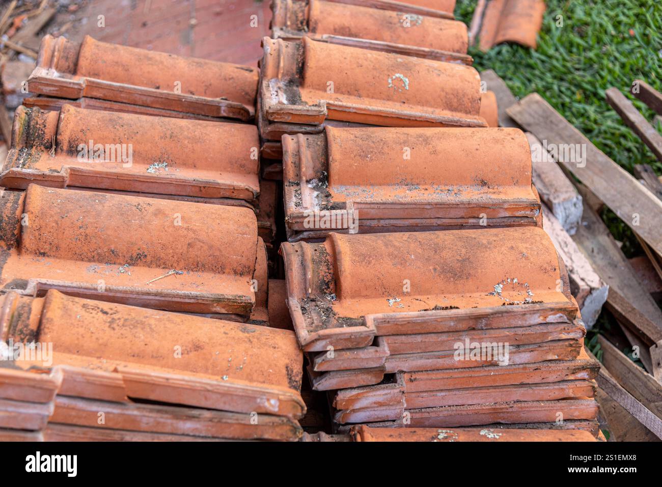 Pile of old clay tiles in a masonry renovation space Stock Photo - Alamy