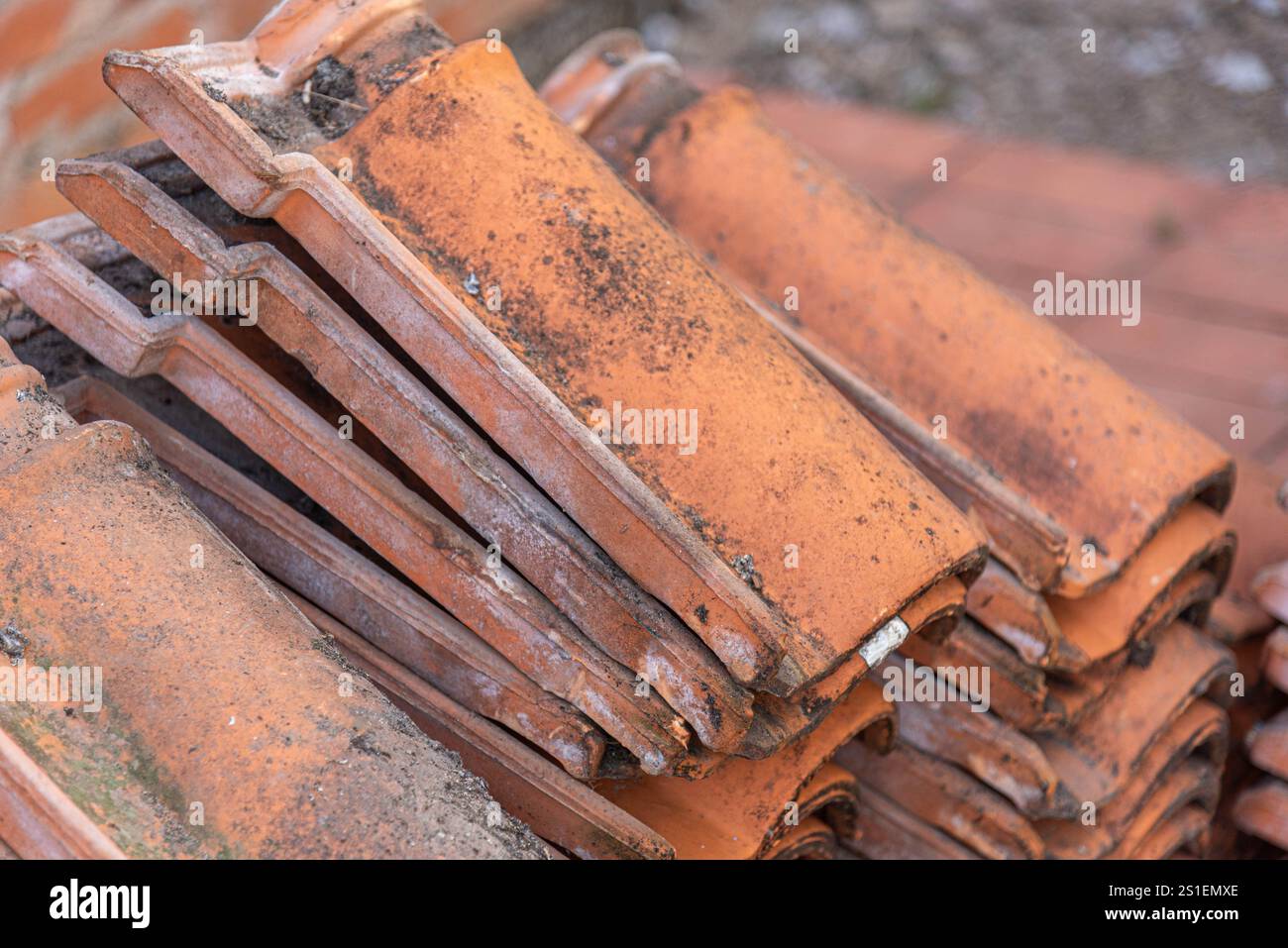 Pile of old clay tiles in a masonry renovation space Stock Photo - Alamy
