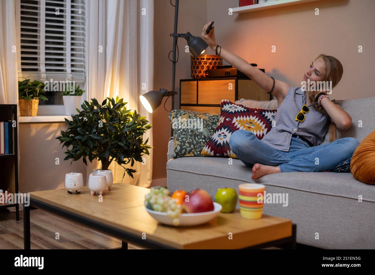 Cozy Evening Selfie in a Bright and Welcoming Living Room to Capture a ...