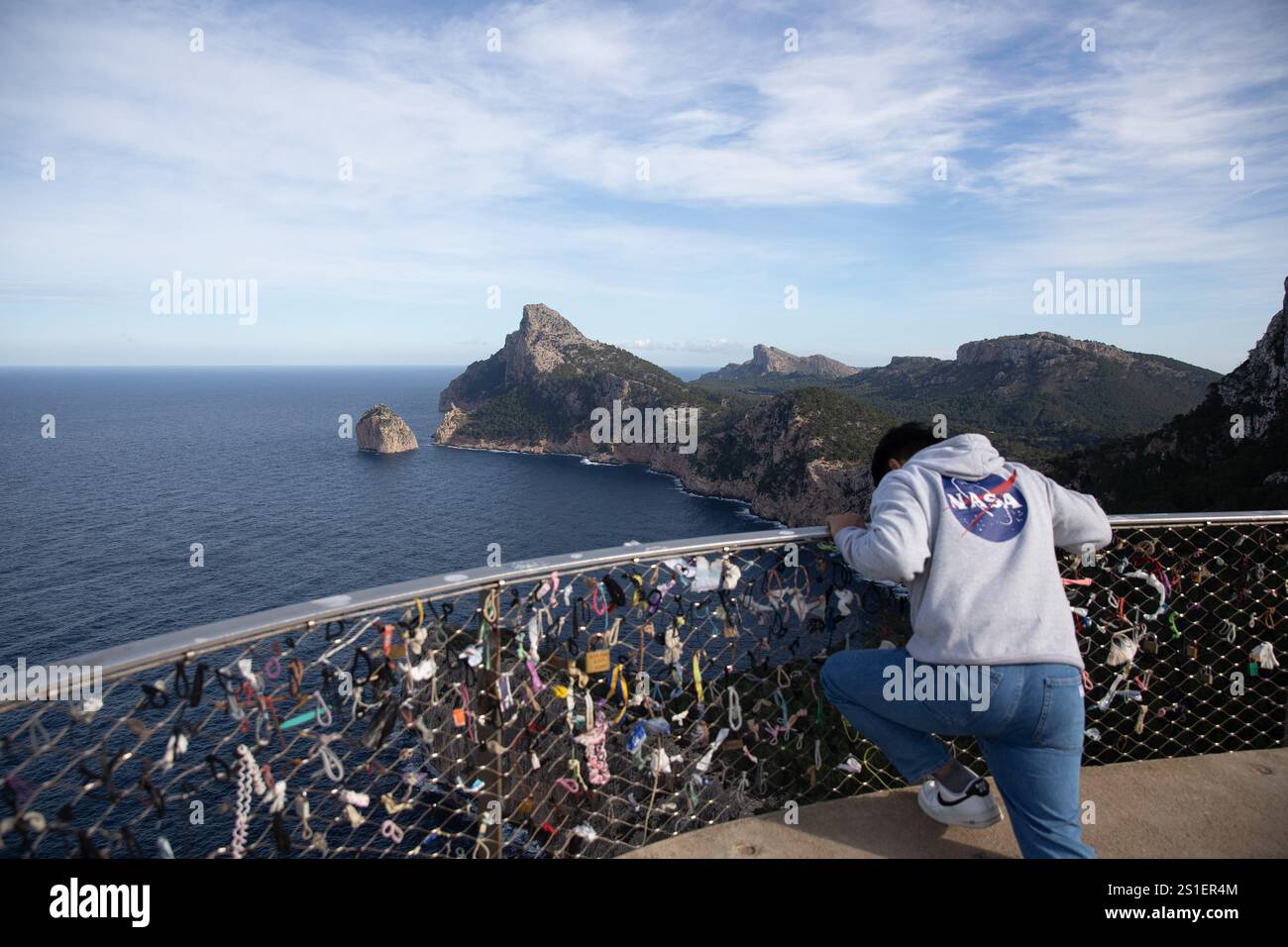 03 January 2025, Spain, Pollença: A man at the "Mirador Es Colomer ...