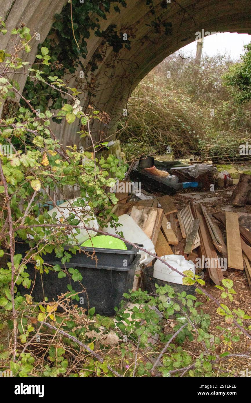 A casual open ended shed made from curved corrugated sheets to keep the ...