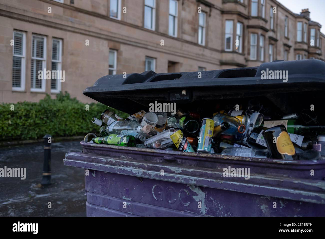 In the gloaming of dusk in Pollokshields, in Glasgow, Scotland, 3 ...