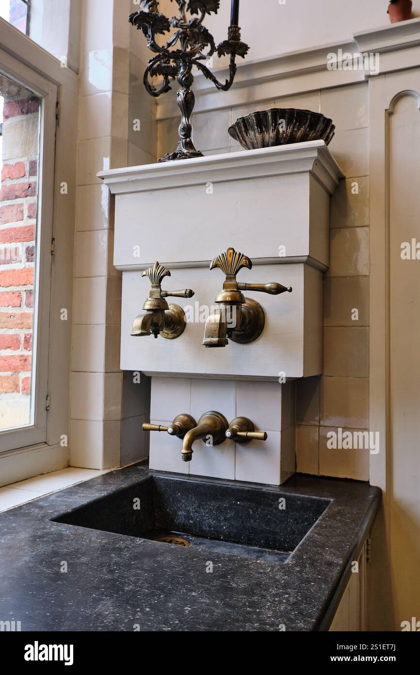 Classic brass faucets with an antique design in a Dutch historic ...