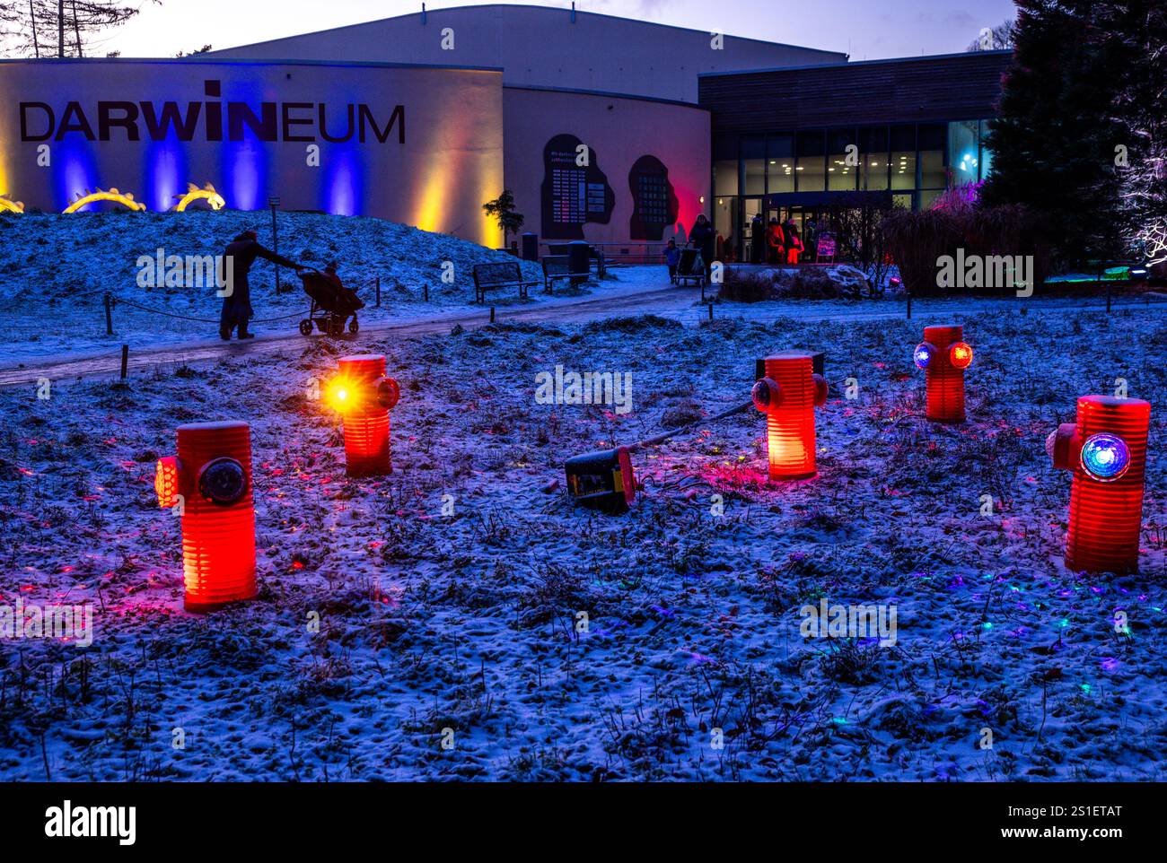 Rostock, Germany. 03rd Jan, 2025. The first visitors walk past the ...