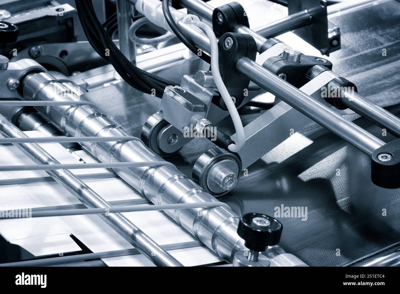 Elements of corton boxes are collected in stack. Conveyor line for the ...