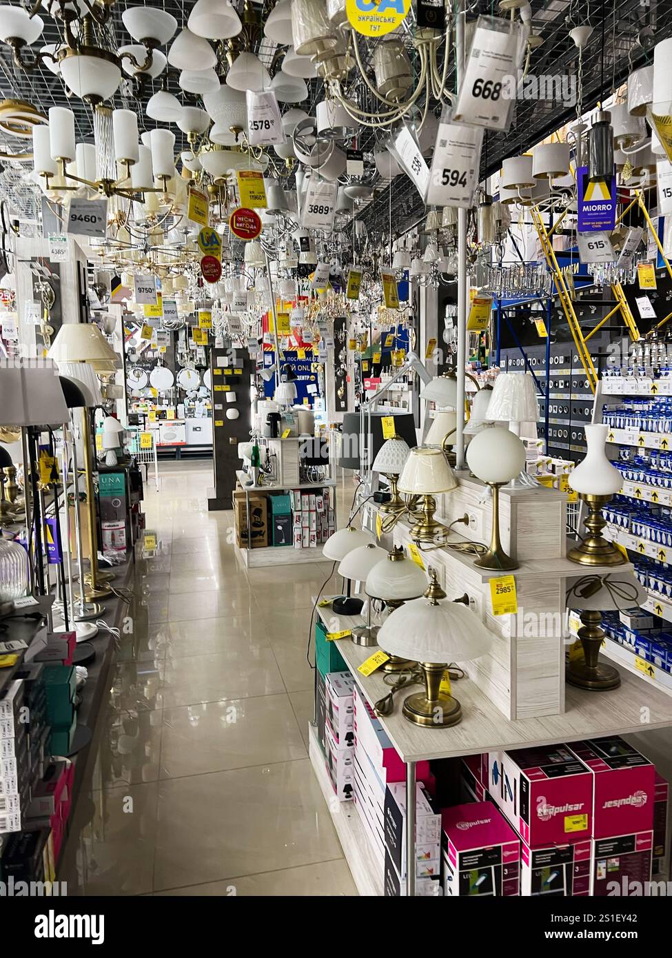 Kyiv, Ukraine - January 03, 2025: An aisle in a lighting store showcasing an extensive ...