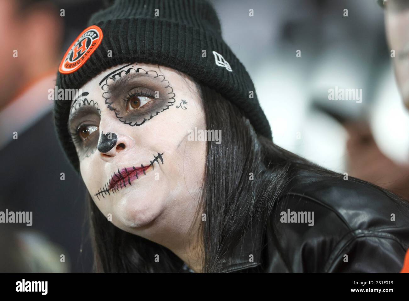 HERMOSILLO, MEXICO - OCTOBER 31: A female baseball fan attends the game ...