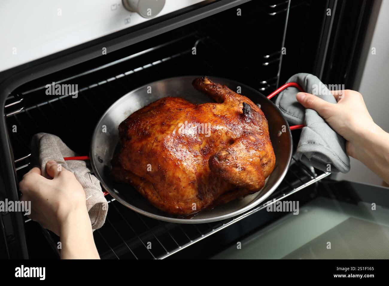Woman taking golden baked hi-res stock photography and images - Alamy