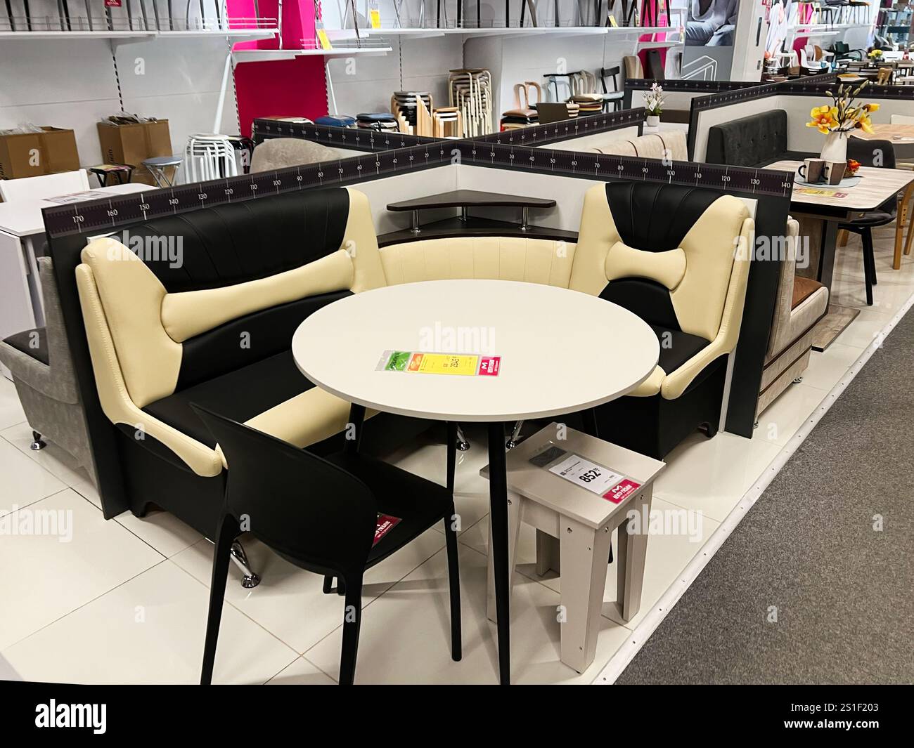 Kyiv, Ukraine - January 03, 2025: Modern dining setup featuring a round ...