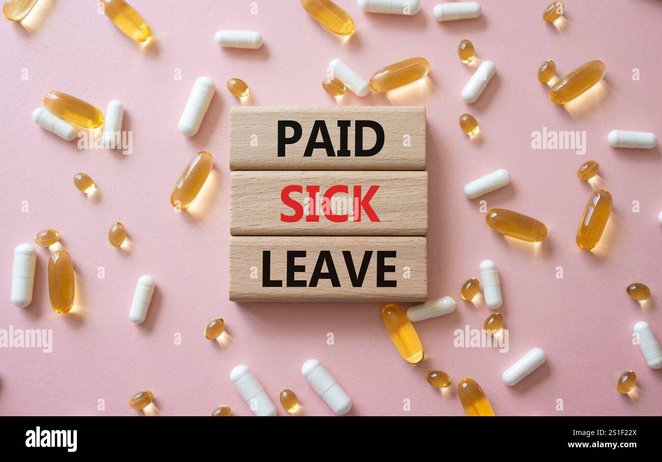 Paid Sick Leave symbol. Concept words Paid Sick Leave on wooden blocks ...