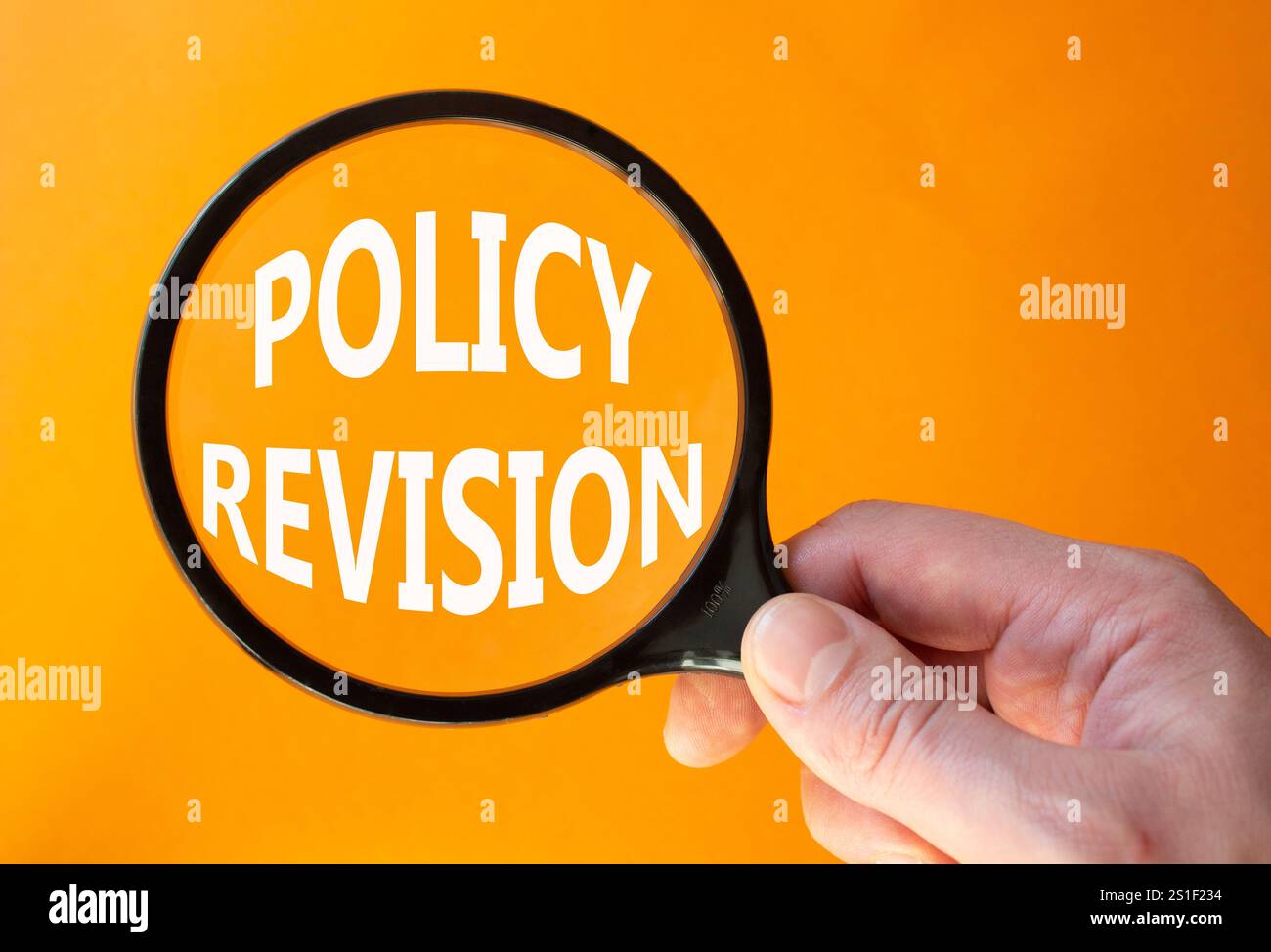 Policy revision symbol. Concept word Policy revision on magnifying ...