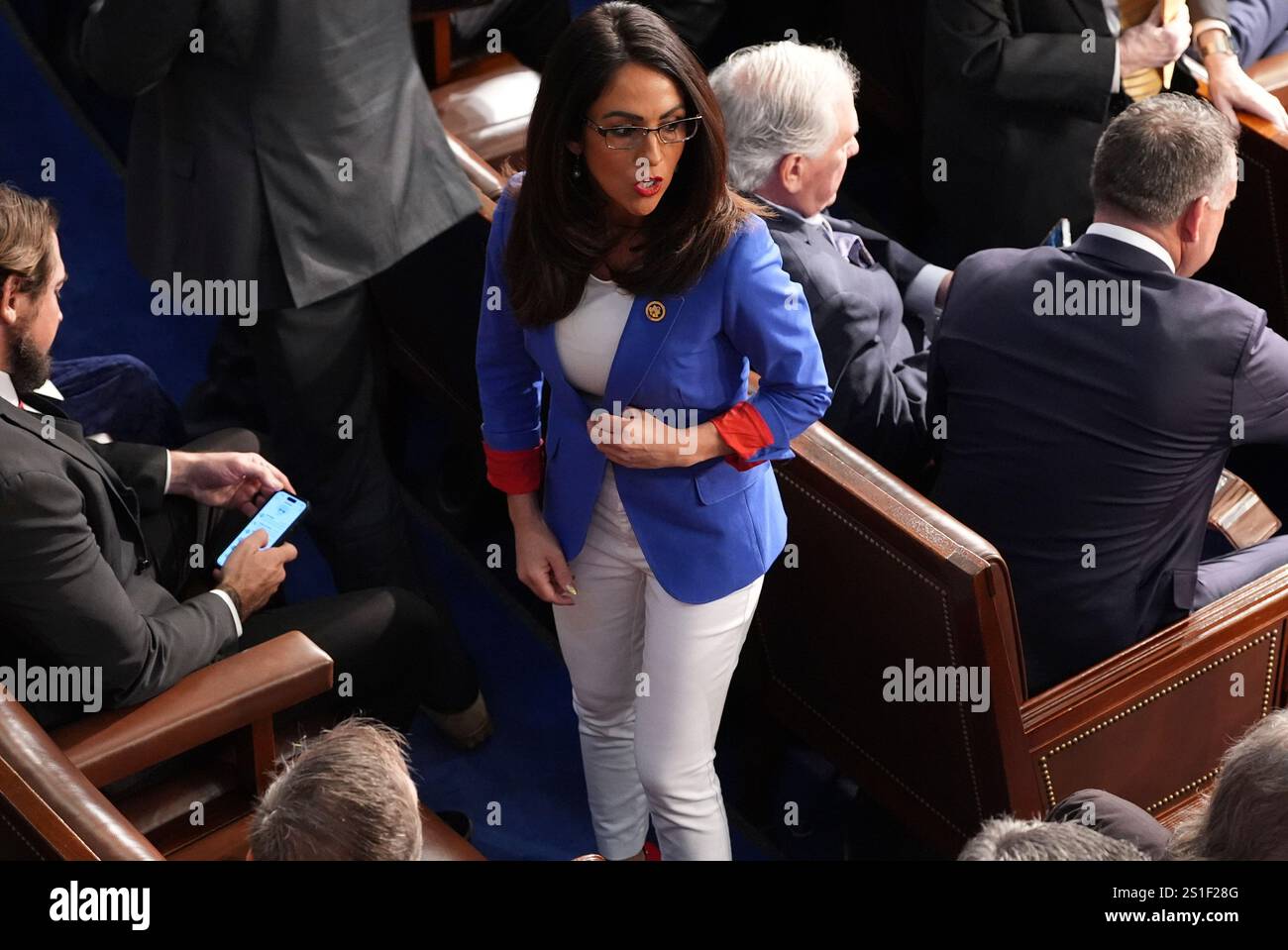 Rep. Lauren Boebert, R-Colo., speaks with members as the House of ...