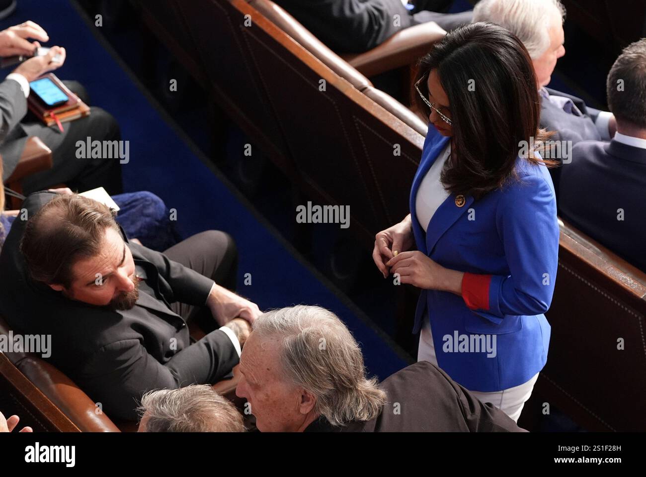 Rep. Lauren Boebert, R-Colo., speaks with members as the House of ...