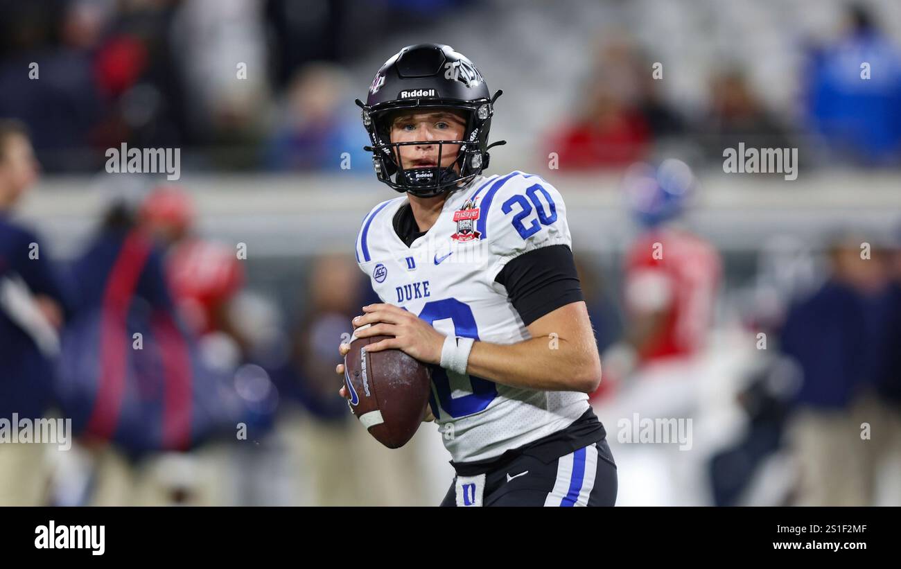 Duke quarterback Donald Tomlin (20) warms up before facing Mississippi ...