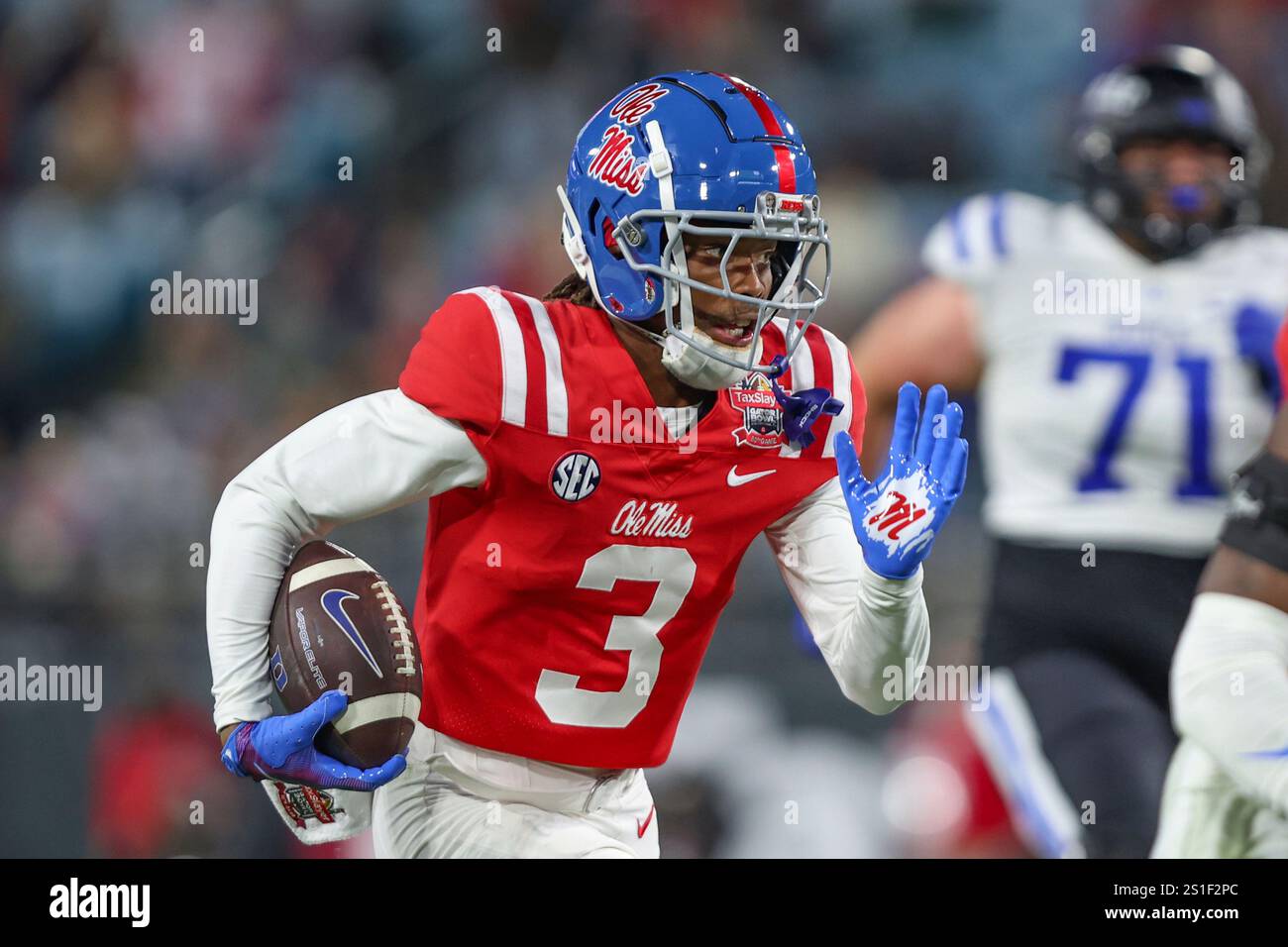 Mississippi cornerback Isaiah Hamilton (3) runs an interception for a ...