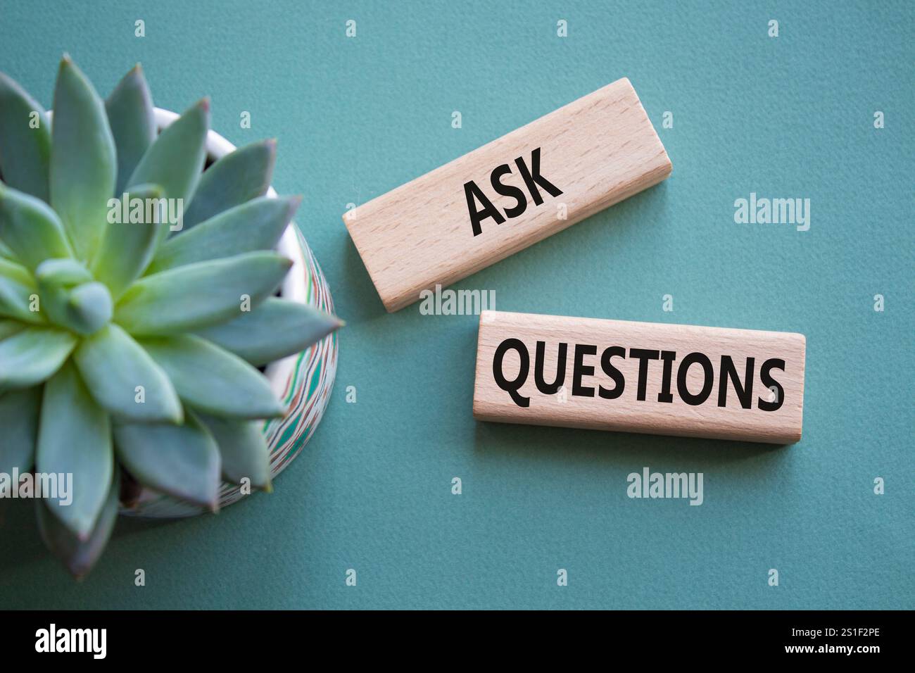 Ask Questions symbol. Wooden blocks with words Ask Questions. Beautiful ...