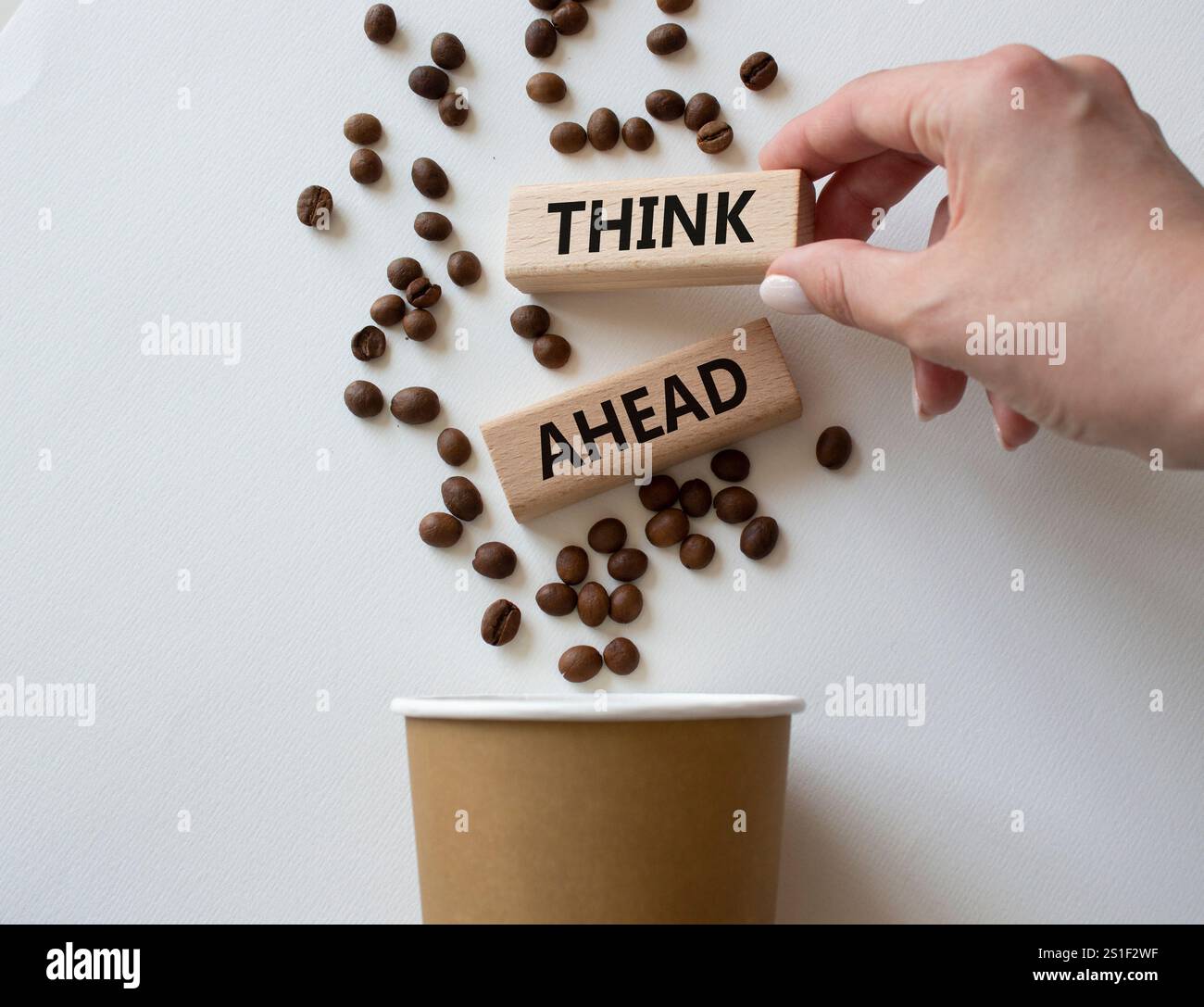 Think ahead symbol. Concept word Think ahead on wooden blocks ...