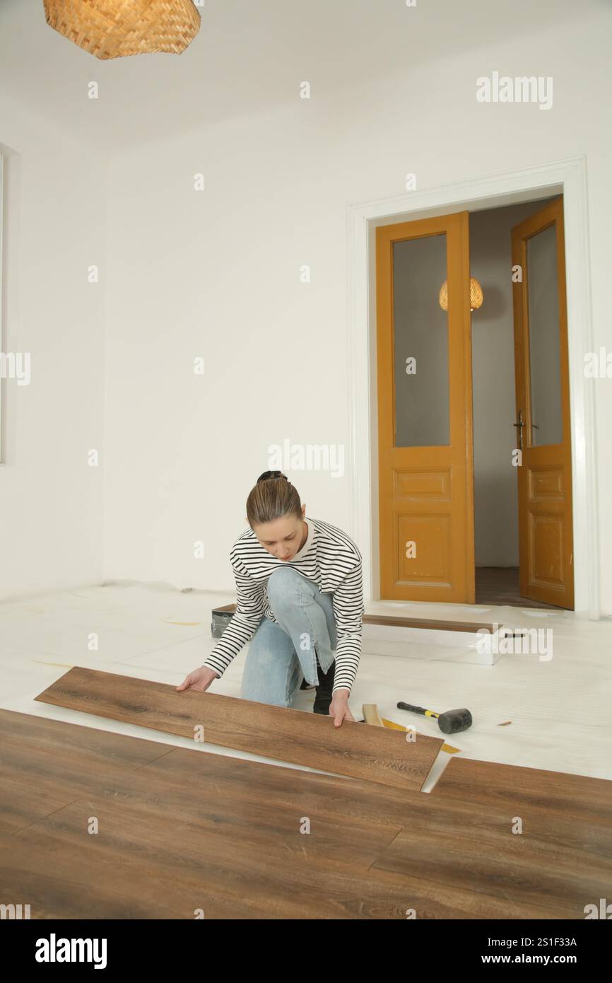 Step by step of laminate flooring installation Stock Photo - Alamy